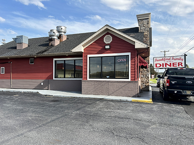 The classic red exterior of Frankford Family Diner stands like a beacon of comfort food hope along the Delaware roadside, promising delicious nostalgia with every visit.
