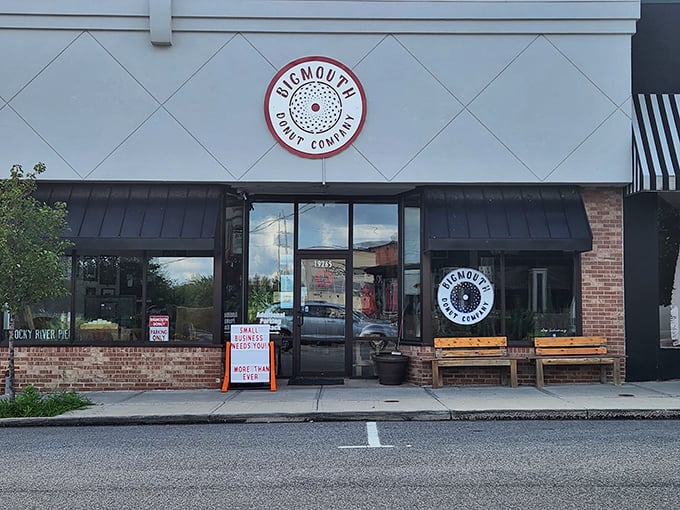 The unassuming storefront of Bigmouth Donut Company beckons with its clean lines and rustic wooden benches&mdash;a temple of fried dough hiding in plain sight.