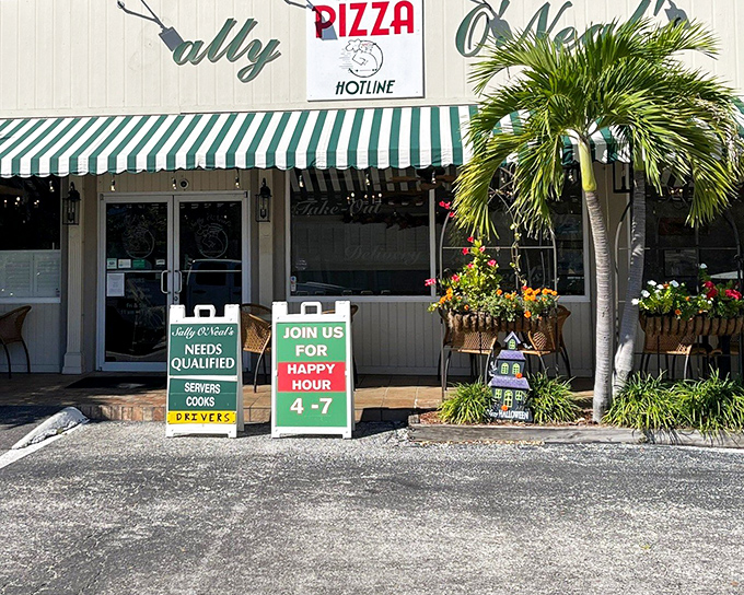 The iconic green and white striped awning of Sally O'Neal's beckons like an old friend, promising Italian comfort in the heart of Tampa.