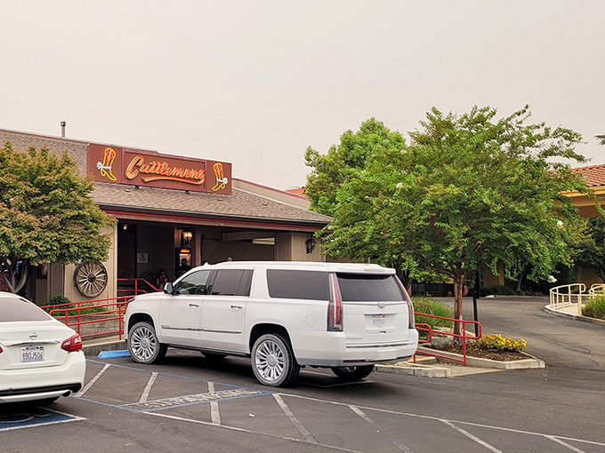 The Western welcome begins at the door. Cattlemens' rustic exterior promises what every carnivore dreams of&mdash;a serious steak experience awaiting inside.
