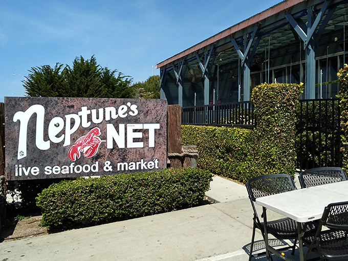 The iconic blue and white facade of Neptune's Net stands proudly on PCH, like California's seafood version of the Hollywood sign.