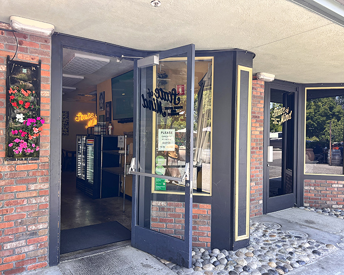 The brick-lined entrance to State of Mind beckons like an old friend, complete with hanging flowers that say "come in, stay awhile." 