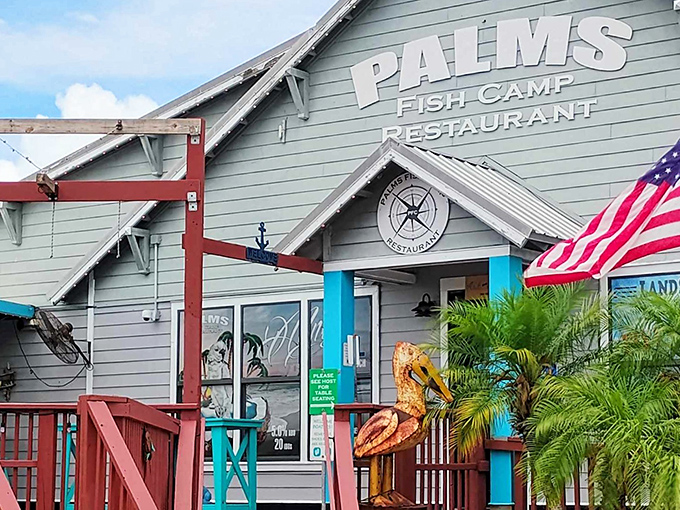 The seafood promised land awaits! Palms Fish Camp's mint-blue exterior with bright turquoise accents practically screams "fresh catch inside!"