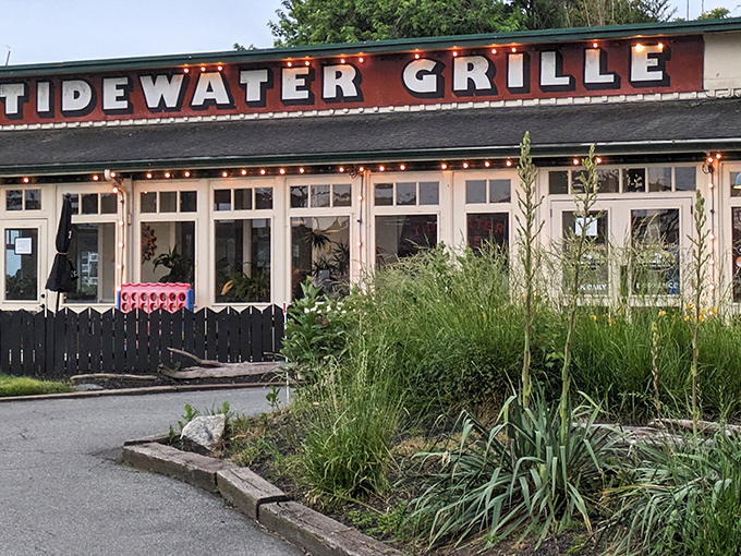 The unassuming exterior of Tidewater Grille belies the culinary treasures within. Like finding a pearl in an oyster, this waterfront gem awaits discovery.