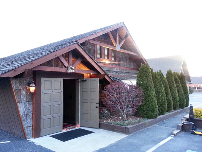 The iconic Peddler sign welcomes hungry travelers like a beacon in the night. Established in 1968, this Boone landmark promises carnivorous delights within.