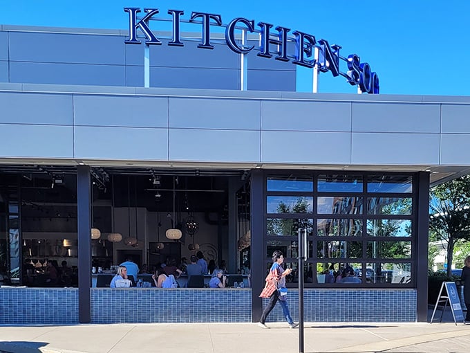 Kitchen Social's sleek blue signage beckons like a culinary lighthouse, promising modern comfort in Dublin's dining landscape.