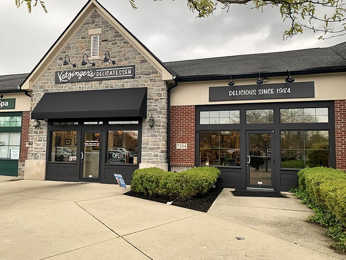 Katzinger's stone facade welcomes hungry pilgrims with the promise of delicatessen nirvana. That "Delicious Since 1984" sign isn't just marketing&mdash;it's a time-tested guarantee. 
