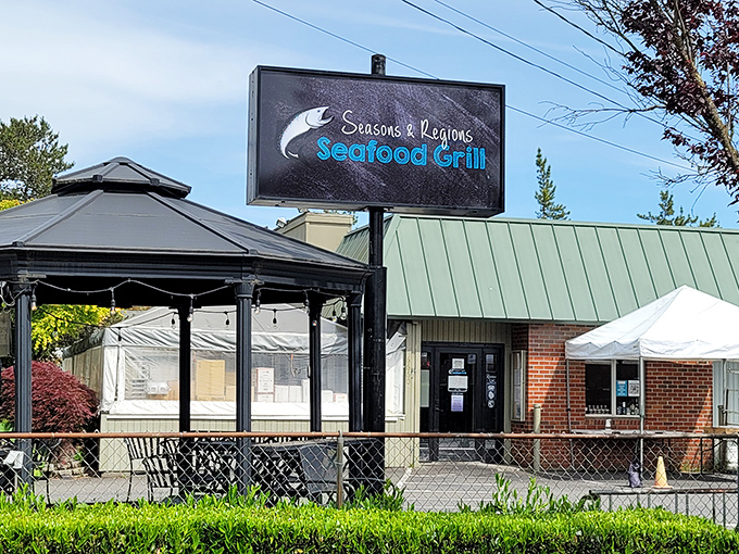 The unassuming exterior of Seasons & Regions Seafood Grill hides culinary treasures within, like a seafood speakeasy waiting to be discovered.