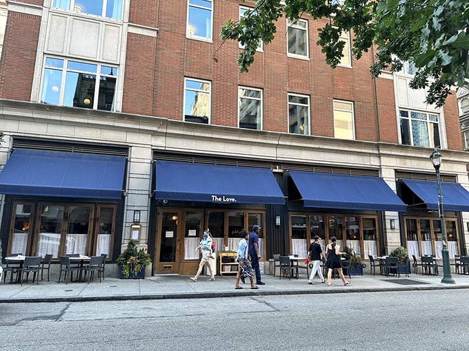 The Love's distinctive blue awnings beckon hungry Philadelphians like a culinary lighthouse on Rittenhouse Square. Impossible to miss, impossible to resist.