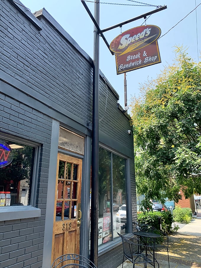 The unassuming gray brick exterior of Speed's hides culinary treasures within, like a sandwich speakeasy waiting to be discovered.