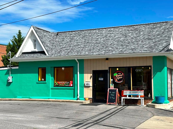 The turquoise beacon of Tropical Spice stands out like a Caribbean island dropped into the Virginia landscape, promising culinary adventures behind its modest fa&ccedil;ade.