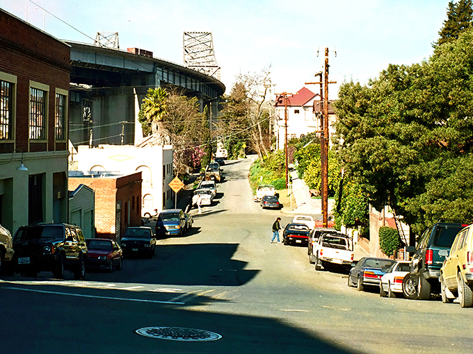 Steep streets and vintage charm define Crockett's downtown, where the imposing Carquinez Bridge stands sentinel over this hidden Bay Area gem.