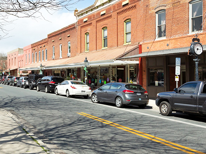 Main Street magic at its finest. These historic brick storefronts aren't just preserved&mdash;they're alive with shops that would make Norman Rockwell reach for his paintbrush.