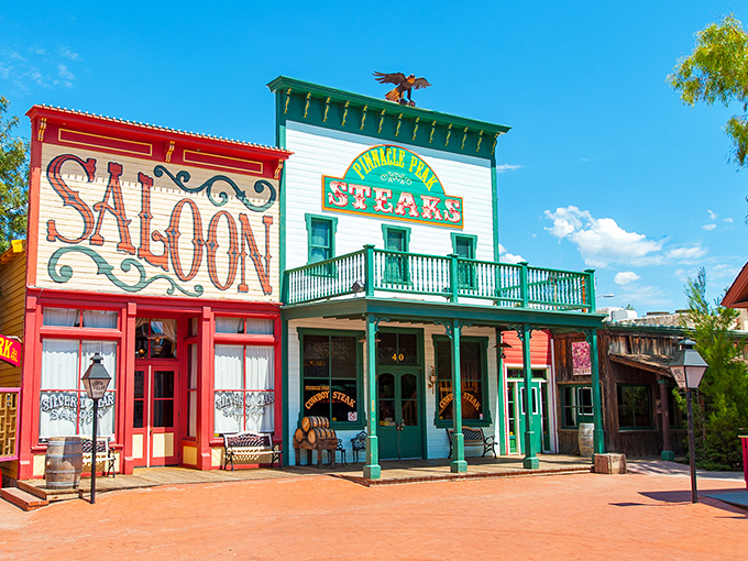 Step into the Old West at Pinnacle Peak, where the vibrant saloon-style facade promises adventures in flavor before you even reach the door.