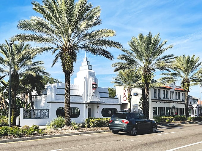 Art Deco dreams come alive on Granada Boulevard, where palm trees stand guard over gleaming white facades that whisper tales of Florida's glamorous past.