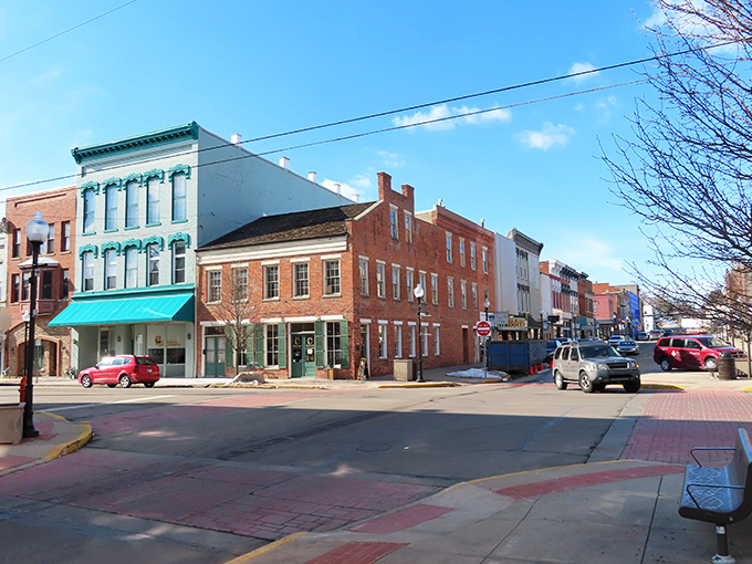 Downtown Huntington's historic buildings stand like well-preserved time capsules, where brick facades tell stories of generations past while welcoming new memories.