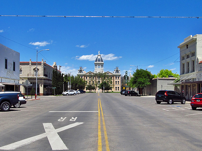 Downtown Marfa, where the historic Presidio County Courthouse stands like a Victorian sentinel watching over a town where time moves at its own delightful pace.