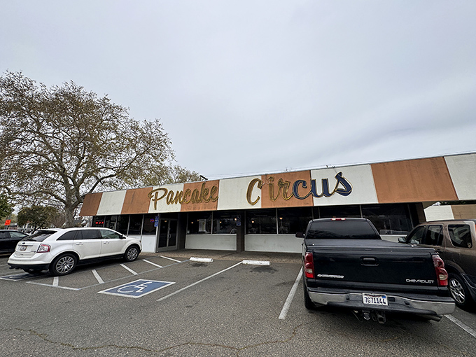 The iconic striped facade of Pancake Circus stands as a beacon of breakfast hope on Sacramento's Broadway. Classic Americana at its finest!