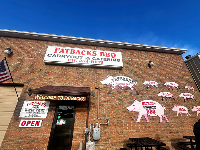 The barbecue beacon of Dayton! Fatback's brick exterior with its parade of pig cutouts promises a smoky pilgrimage worth every mile of your journey.