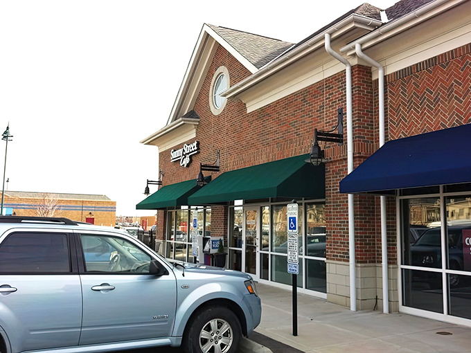 This brick beauty in Westerville proves that good things come wrapped in green awnings and endless parking spots.