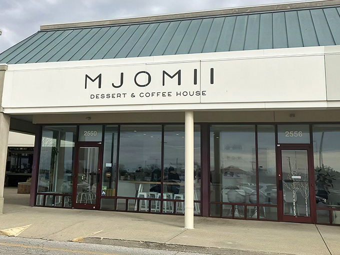 Minimalist elegance meets sweet indulgence at Mjomii's storefront. The clean lines and understated signage belie the flavor explosions waiting inside.