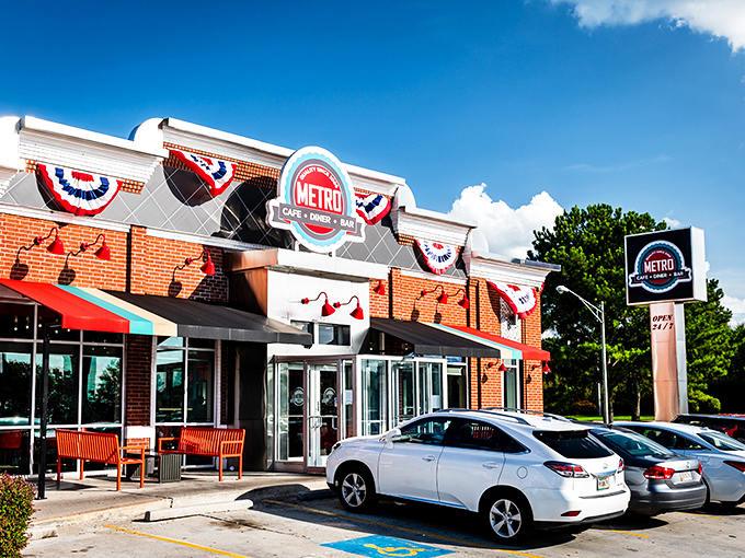 The iconic red and white exterior of Metro Cafe Diner stands like a beacon of comfort food against Stone Mountain's blue sky.