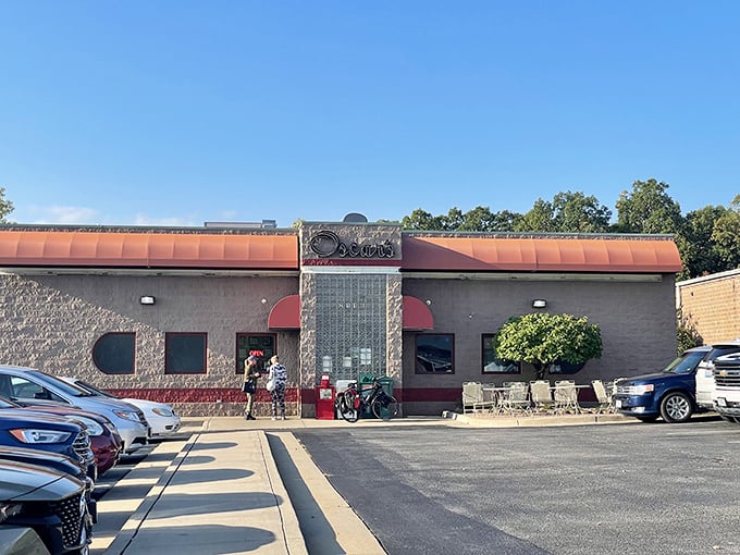 The copper-topped awning of Oscar's Classic Diner beckons like a beacon of comfort food salvation amid Jefferson City's bustling streets. 