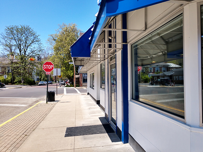 The bright and bold blue awning of Carl&rsquo;s Townhouse pops against a sunny Chillicothe corner, inviting passersby to step in for a taste of classic Americana.