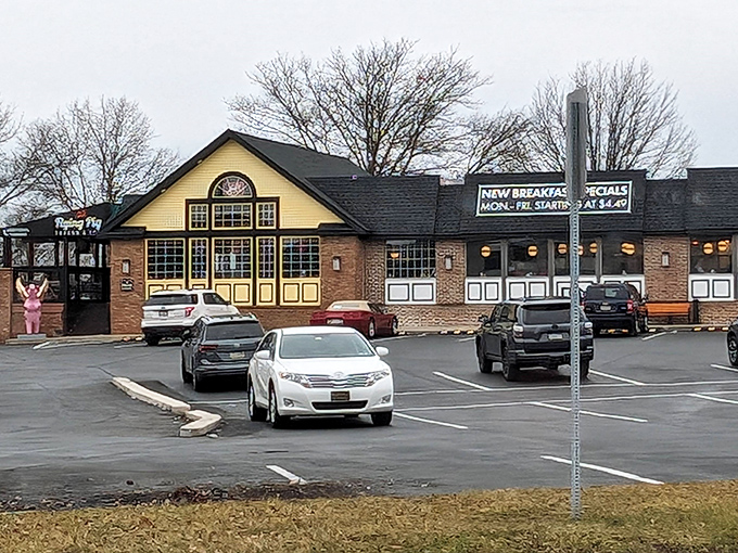 The classic yellow-and-brick exterior of Limerick Diner stands as a beacon of breakfast hope along Ridge Pike, promising French toast dreams come true.
