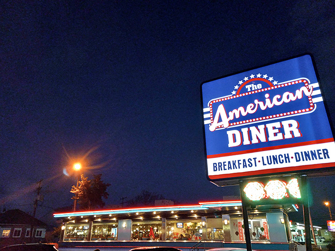 The classic chrome-and-glass exterior of The American Diner gleams in the Pennsylvania night, a beacon for hungry travelers and locals alike.