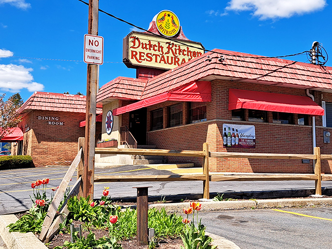 The iconic red-roofed Dutch Kitchen stands like a beacon of comfort food along Route 61, complete with charming tulips greeting hungry travelers.