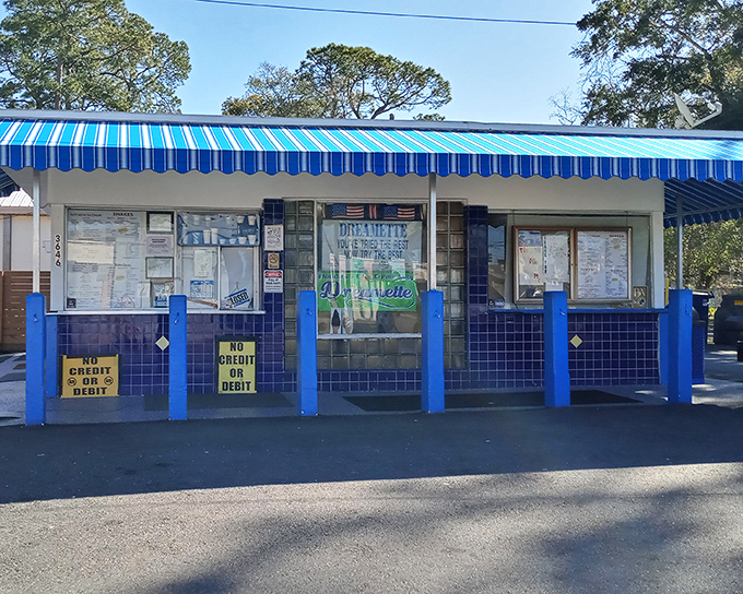 The blue-and-white striped awning of Dreamette stands like a beacon of frozen hope in Jacksonville's heat. Classic Americana at its sweetest.