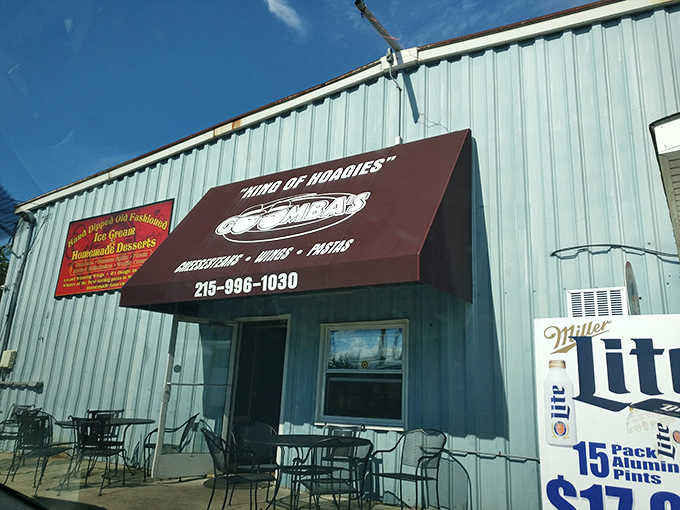 The unassuming blue exterior of Goombas proudly declares its royal status as "KING OF HOAGIES" &ndash; a bold claim that, as you'll discover, is absolutely justified.