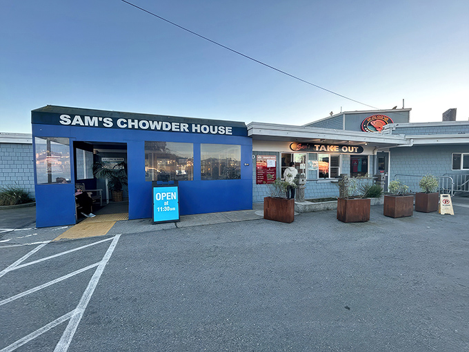 The blue facade of Sam's Chowder House stands like a beacon of seafood salvation on the Half Moon Bay coastline.