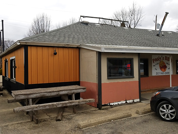 The unassuming exterior of Pauly's BBQ might fool you, but that orange siding is basically a beacon saying, "Barbecue nirvana happens here."