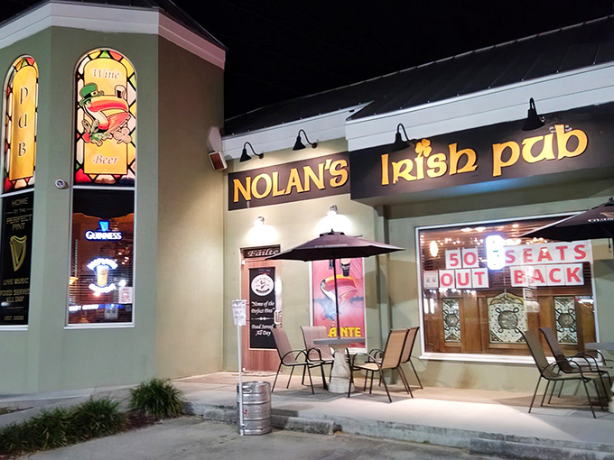 The emerald beacon of Nolan's Irish Pub glows against the Florida night, a Celtic oasis where astronauts and beach-goers alike find common ground over perfect pints.
