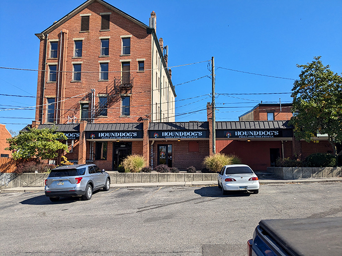 The brick fortress of flavor that is Hounddog's Pizza stands proudly on North High Street, promising culinary adventures within its unassuming exterior.