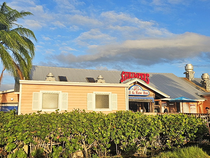 Shrimpers' cheerful yellow exterior welcomes you like an old friend, with palm trees swaying as if to say "come on in, the seafood's fine!"