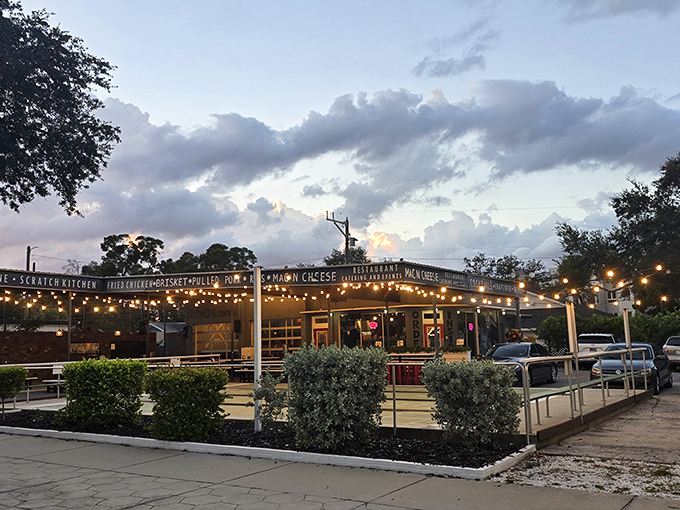 Twilight transforms Urban Brew's patio into a magical oasis where string lights twinkle like fireflies and the aroma of smoked meats beckons hungry souls.