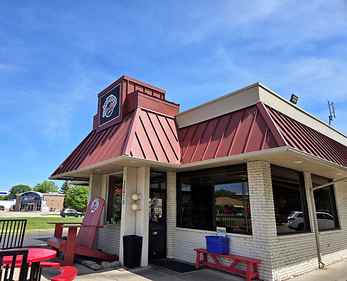 The iconic red metal roof of Anchor Bay Pit Stop Diner stands out like a beacon for hungry travelers. Michigan's answer to the roadside diners of yesteryear, complete with small-town charm.