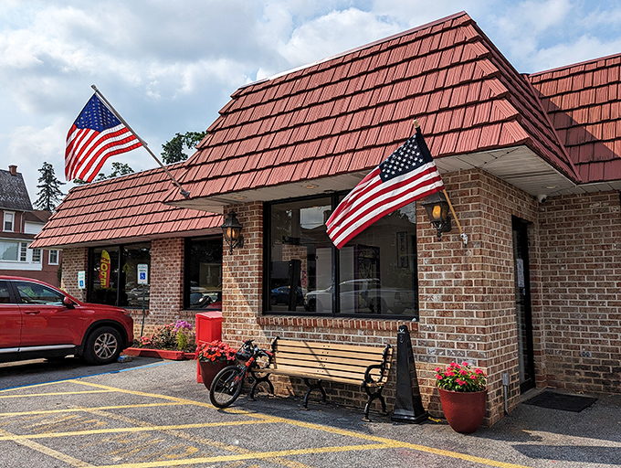 The iconic red-roofed brick building with American flags proudly waving says everything you need to know&mdash;comfort food and patriotism served in equal measure.