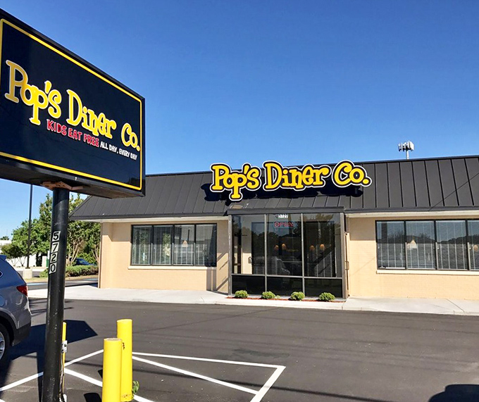 The bright yellow Pop's Diner Co. sign promises breakfast salvation to hungry travelers on Northampton Boulevard. Morning magic awaits!