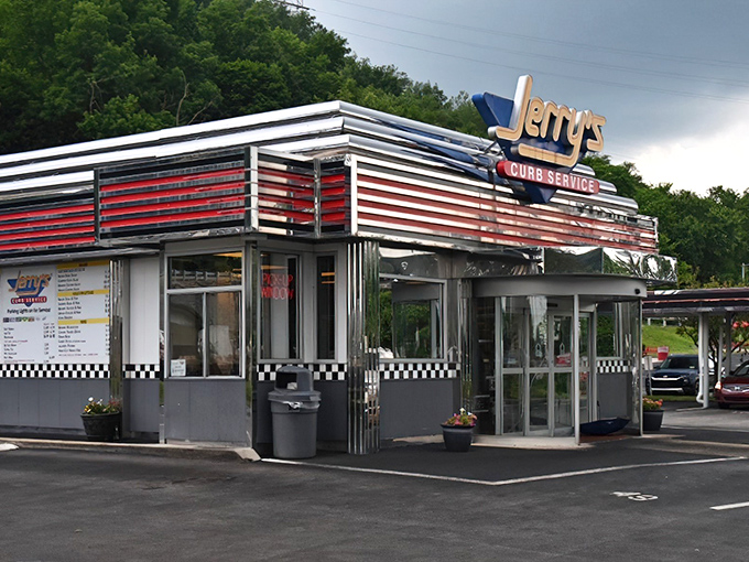 The gleaming chrome and neon of Jerry's Curb Service isn't just a restaurant sign&mdash;it's a time machine to when drive-ins ruled and dinner came with a side of nostalgia.