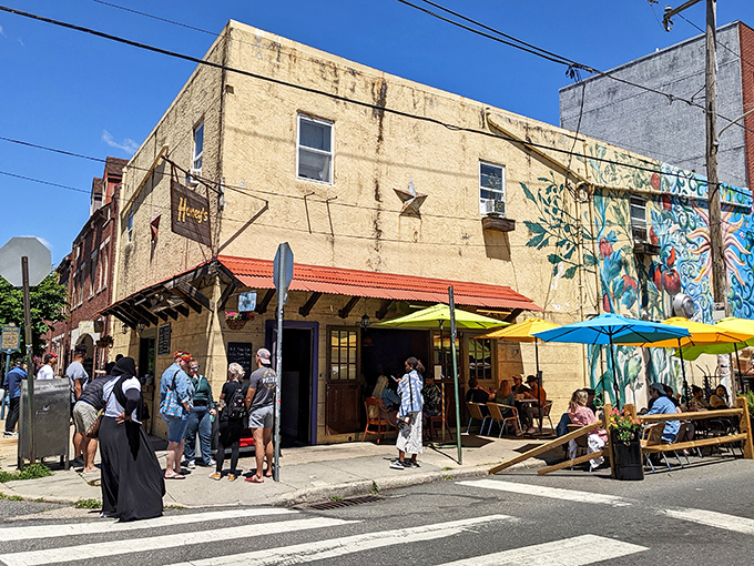 The sidewalk seating at Honey's beckons like an urban oasis, where colorful umbrellas and the promise of comfort food create Philadelphia's perfect breakfast backdrop.