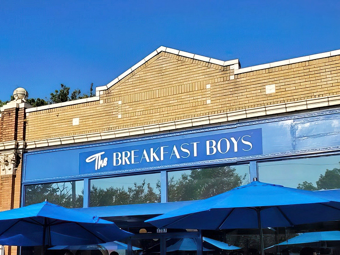 The blue awnings of The Breakfast Boys beckon like a morning oasis in College Park, where patio diners soak up Georgia sunshine while waiting for breakfast nirvana.