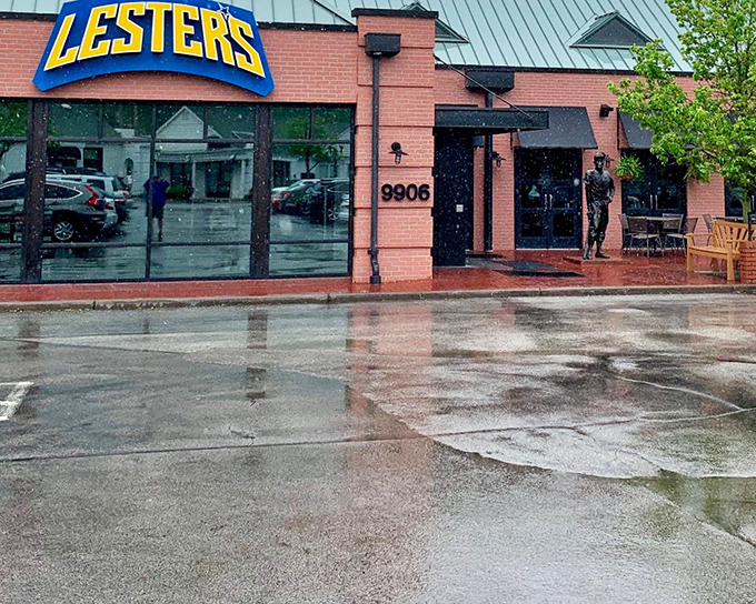 The bright blue Lester's sign beckons like a lighthouse for the sandwich-starved, promising delicious refuge even on rainy days.