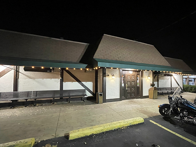 The unassuming exterior hides culinary treasures within, like finding a Ferrari parked behind a garden shed. Those twinkling lights promise Italian magic awaits.