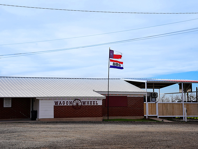 The Wagon Wheel Dance Hall stands proudly like a mirage of barbecue dreams in the Texas countryside.