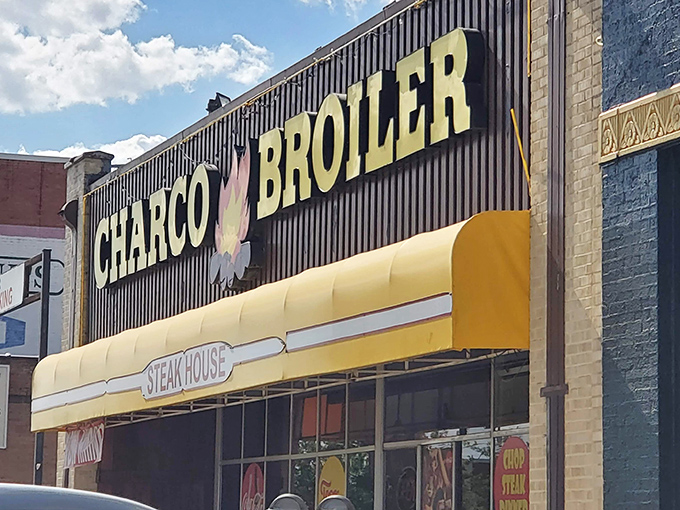 That iconic yellow awning and bold signage isn't just a restaurant front&mdash;it's a beacon of hope for the steak-deprived souls of Dallas.