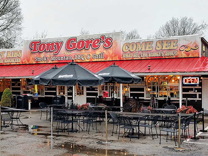 The flame-decorated signage isn't just for show&mdash;Tony Gore's red-roofed roadside haven delivers heat in both atmosphere and flavor.